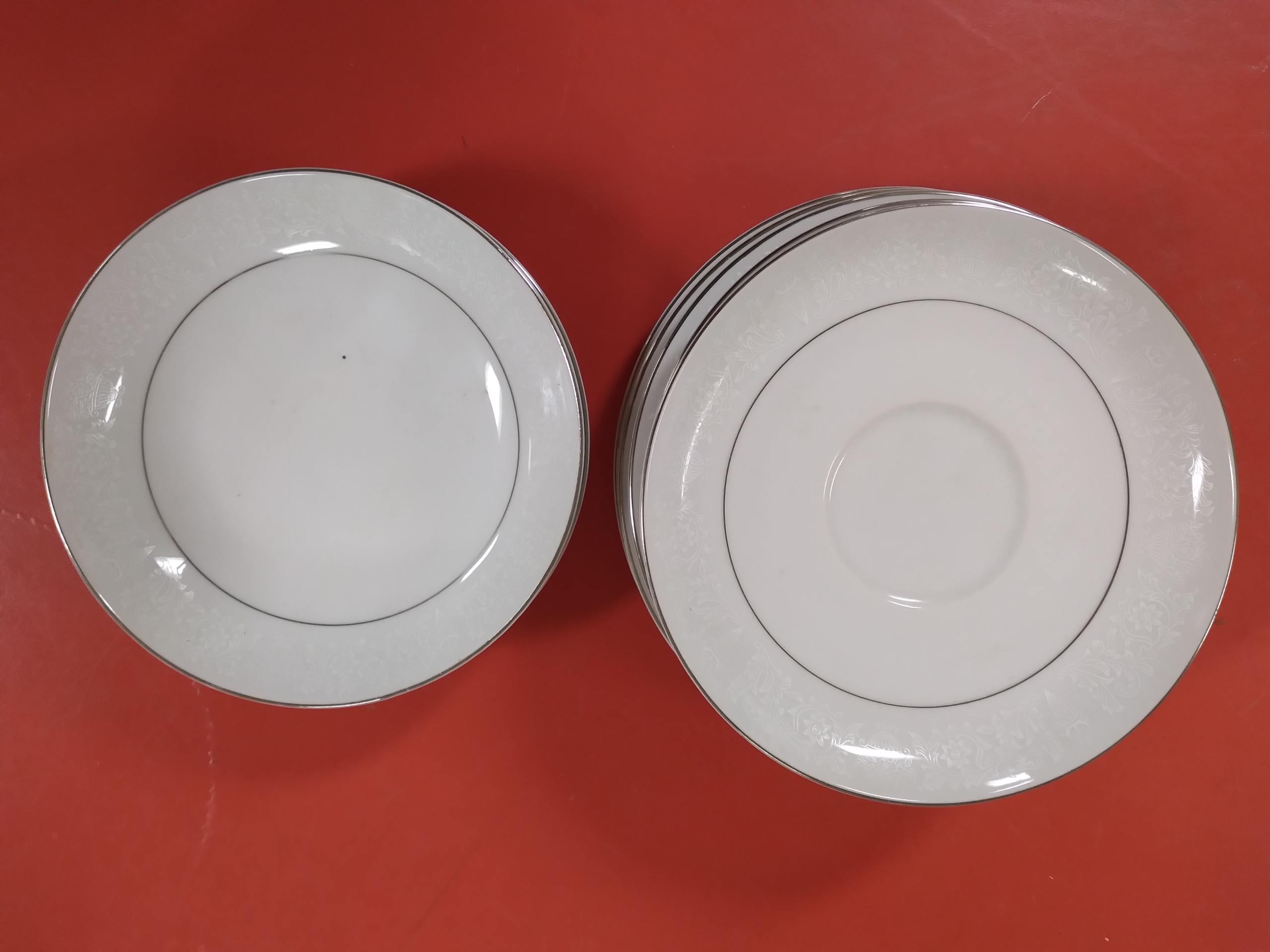 Silver-rimmed plates and bowls – Prop Closet